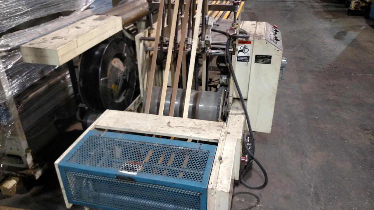 Lot #38: Stobb PXC Vertical Stacker Bundler w/ Signode Strapper - WireBids